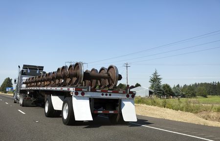 Navigating the Road: A Comprehensive Guide to Flatbed Trailers