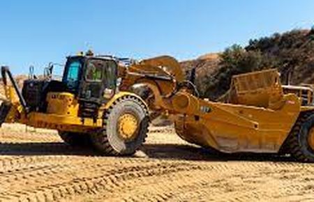 The Versatility of Cat Scrapers: Essential Heavy Machinery for Earthmoving