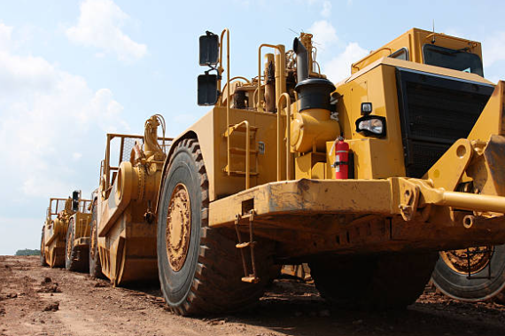 Scrapers Heavy Equipment Uses - Boom & Bucket