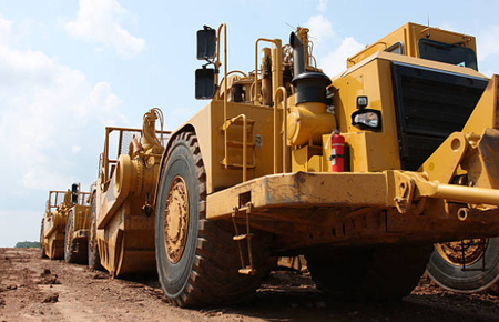 Scrapers Heavy Equipment Uses - Boom & Bucket