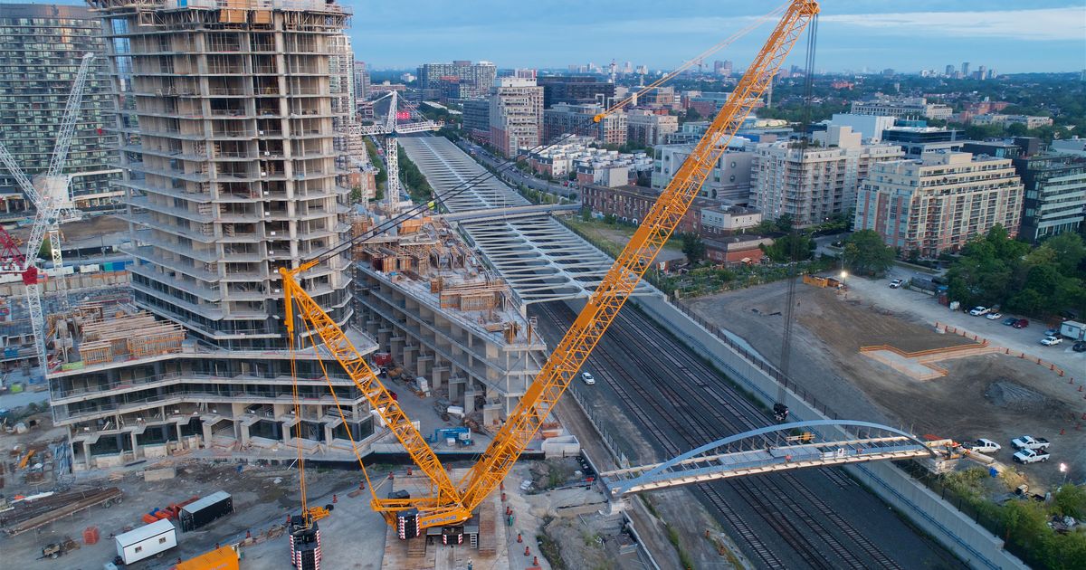 The first of Garrison Crossing’s two bridge spans installed overnight ...